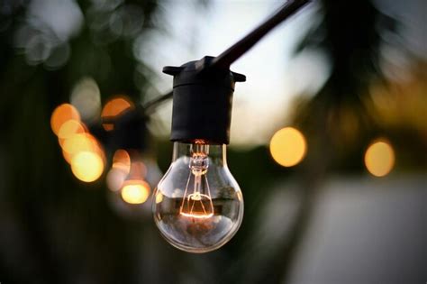 Premium Photo Beautiful Light Source Bulb And Candle Light Premium Photo Beautiful Light Source Bulb And Candle Light