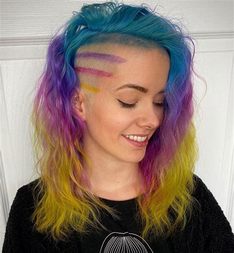 The Coolest Shaved Hairstyles For Women Hair Adviser Half Shaved Hair One Side Shaved