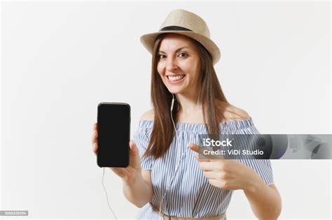 영 빈 블랙 빈 화면을 흰색 배경에 고립 이어폰 휴대 전화에 행복 한 여자 듣기 음악을 재미 사람들 진지한 감정 라이프 스타일