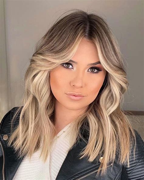 Textured Lob With Bangs And Highlights Foolproof Hairstyles For Round