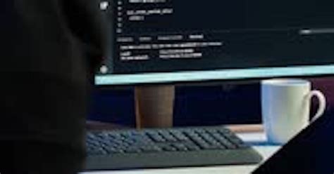 Vertical Video Hacker Arriving In Secret Base With Laptop Ready To Start Programming Viruses