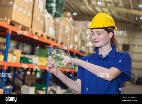 Modern Worker Using Digital Tablet Device With Logistics Inventory