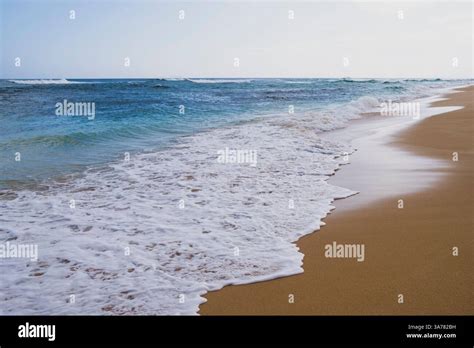 Beach And Surf Along Oahus Wild North Shore Waves Breaking On The