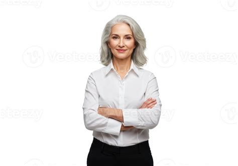 A Confident Woman With Silver Hair Wearing A White Shirt And Black Pants Arms Crossed Smiling