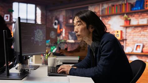Engineer In Tech Startup Office Using Ai Machine Learning Systems On Pc Stock Image Image Of