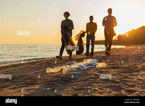 Earth Day Volunteers Activists Team Collects Garbage Cleaning Of Beach Coastal Zone Woman Mans