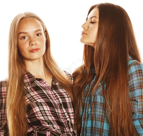 Two Cute Teenagers Having Fun Together Isolated On White Stock Image