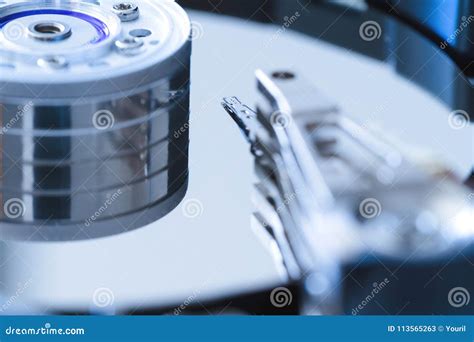 Disassembled Hard Disk Drive Inside Close Up Spindle Actuator Arm Read Write Head Platter