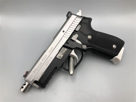 P229 Sport Magazines Have That Sexy Basepad That Matches The Rest Of The Silver On This P229