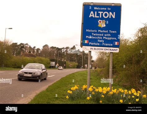Sign For Historic Market Town Of Alton In Hampshire Showing Its Twin
