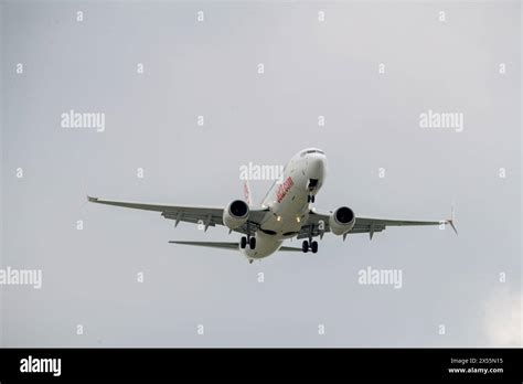 A Logo On The Side Of A Airplane Boeing 737 Landing At East