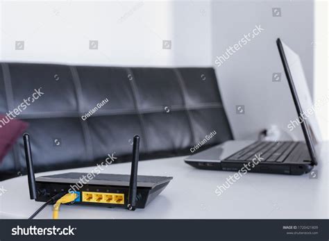 Modern Wifi Router On Light Table Stock Photo 1720421809 Shutterstock