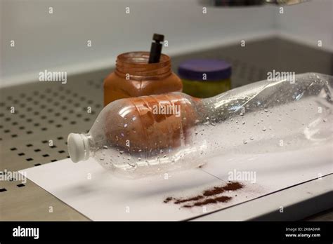 The Expert Examines The Object For Traces In The Form Of Fingerprints