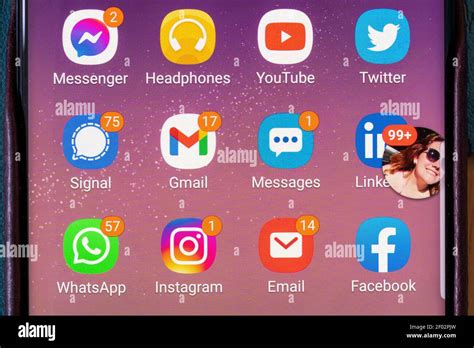 A Closeup On An Android Smartphone Screen Showing Several Apps With
