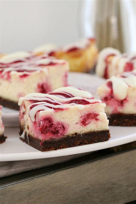 The Best White Chocolate And Raspberry Cheesecake Slice Bake Play Smile