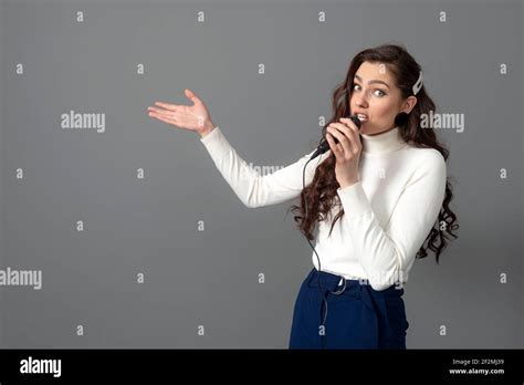 Female Speaker Holds Hi Res Stock Photography And Images Alamy