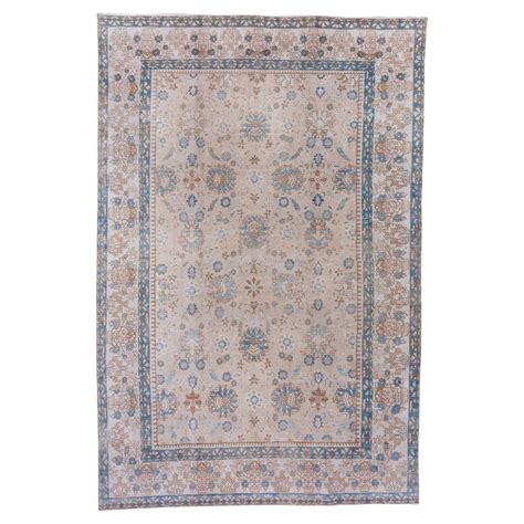 Muted Gray Blue And Ivory Vintage Persian Tabriz Rug With Floral