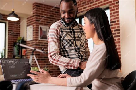 Free Photo Programmers Couple Developing Encryption Code On Laptop Using Terminal Window With