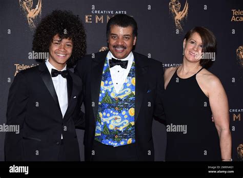 Travis Tyson From Left Neil Degrasse Tyson And Alice Young Arrive At