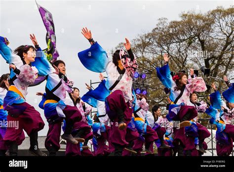 Close Up View Of Japanese Mixed Sex Dance Troupe On Stage Dancing Wearing Traditional Yukata