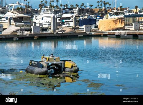 A Robot Floating Trash Collector Sails In Huntington Beach Ca