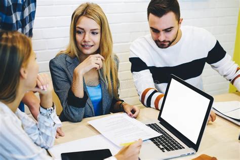 Young It Programmers Collaborating On Creating Application Using Digital Computers Stock Image