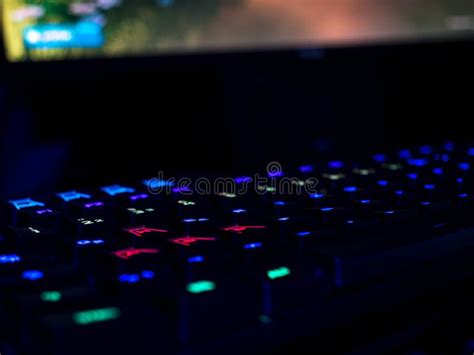 Wasd Gaming Keyboard Rgb Lighting Many Colors With Game In Background
