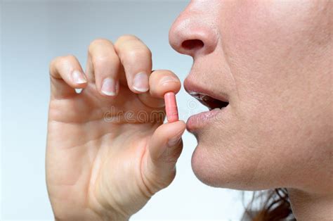 Woman Taking A Mouthful Of Cream Or Ice Cream Stock Image Image Of