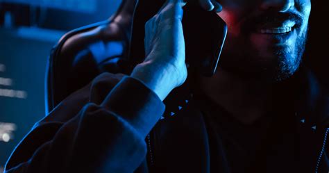 A Male Hacker Is Using A Computer To Hack Data To Demand Ransom From