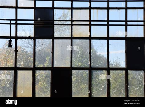 A Grid With Windows Some Of Them Are Closed Stock Photo Alamy