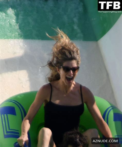 Gisele Bundchen Sexy Seen In A Hot Black Swimsuit As She Goes Down
