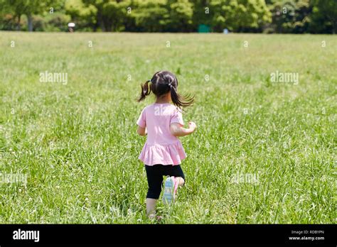 Asian Girl Sticking Out Tongue Fotos Und Bildmaterial In Hoher
