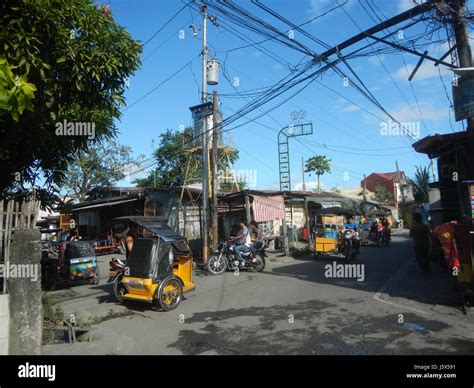 a historical photograph showing the streets of barangays san lorenzo