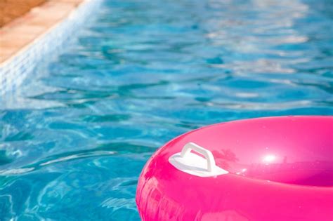 Premium Photo Pink Float Over Swimming Pool In Summer