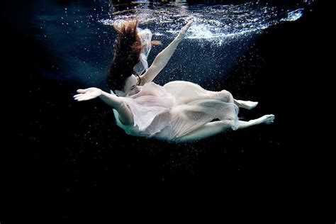 Nina Floating In Pool With Dress Photograph By Dan Friend Fine Art