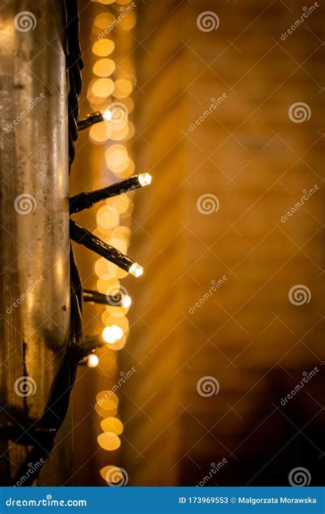 Warm Festive Lights Wrapped Around A Metal Rail Nice Bookeh Dots Copy Space Stock Image