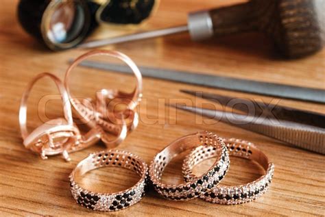 Jewelry And Tools Are On The Table Stock Image Colourbox