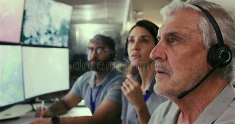 Group Engineers And Launch Of Satellite In Control Room With Headset Communication And Ground