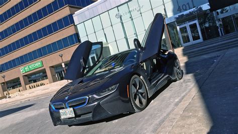 Head To Head Bmw I8 Vs Tesla P85d Autotraderca