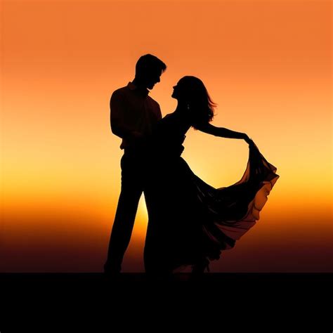 Silueta De Una Pareja Bailando Al Atardecer Foto Premium