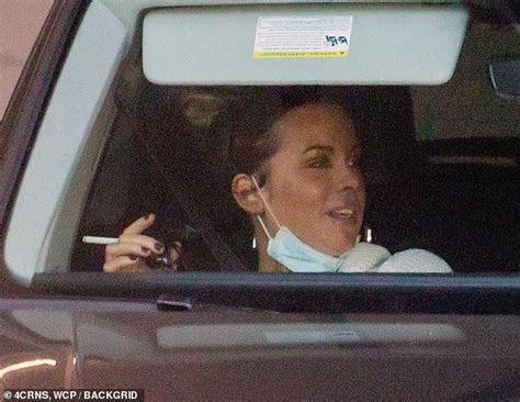 Kate Beckinsale 47 Pulls Down Her Face Mask To Smoke A Cigarette