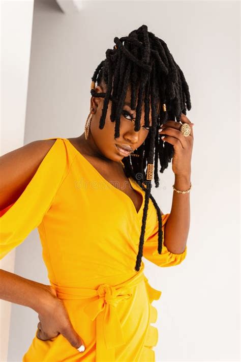 Pretty Beautiful Young Black Woman With Cool Dreadlocks With In Jeans