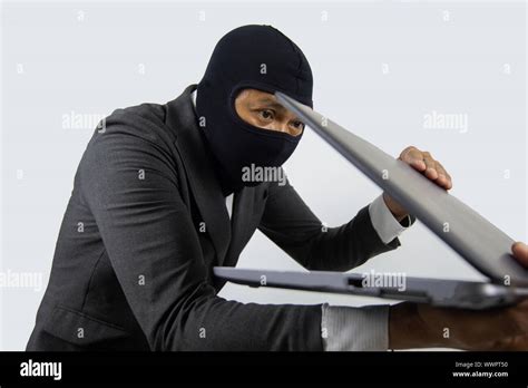 Concentrated Trained Masked Computer Hacker At Stealing Data From