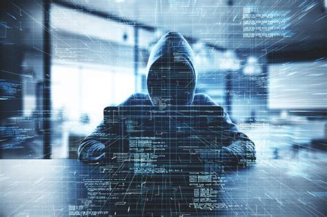 Premium Photo Hacker At Desk Using Computer With Creative Glowing