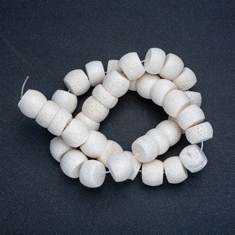 Намистини на нитці натуральний білий Губчастий Корал рондель діаметр 16х11мм довжина 41