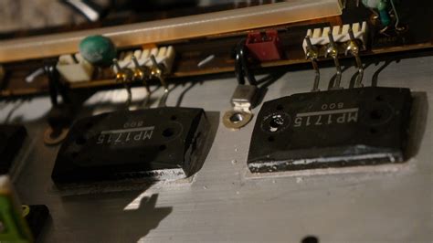 Help Id Audio Amplifier Capacitor With Strange Bracket Marking Next To