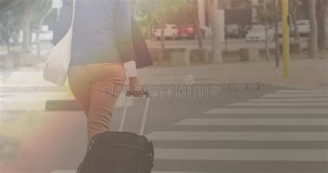 A Middle Aged African American Woman Partner Is Crossing Street