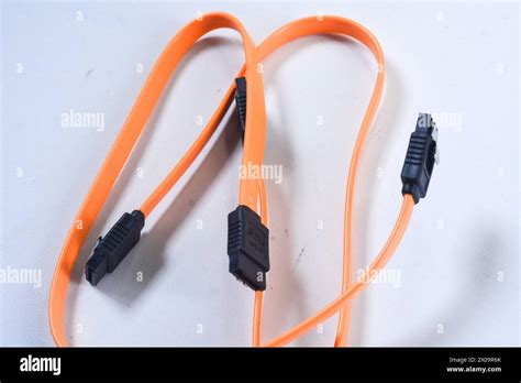 Close Up Orange Serial ATA SATA Cable Connected To Computer
