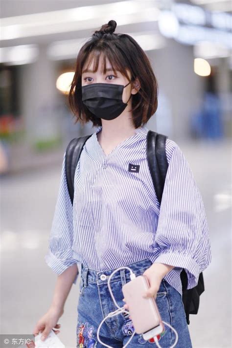 譚松韻半扎蘋果頭現身機場，網友：這身打扮青春又減齡，真好看！ 每日頭條