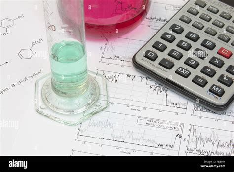 Chemistry Lab Chemicals Graphs And A Scientific Calculator Stock Photo Alamy